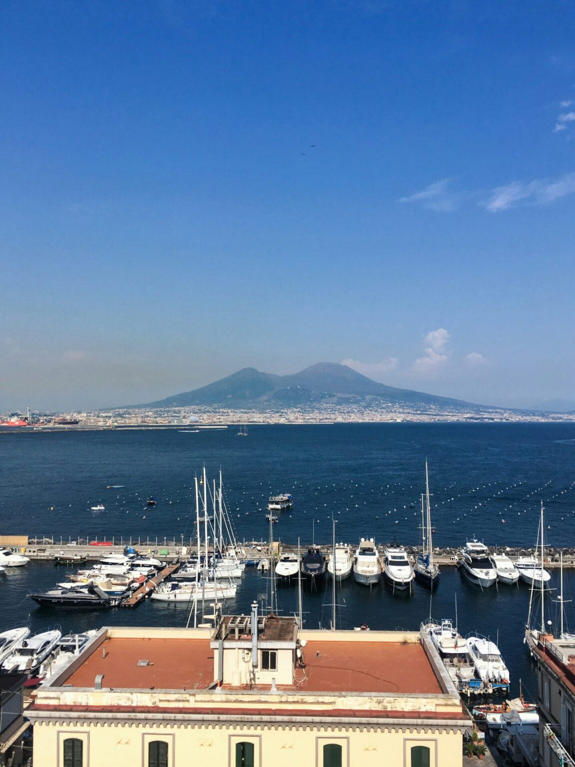 The Vibrant Heart: Street Life in Naples' Ancient Grid - Bellas Bold ...
